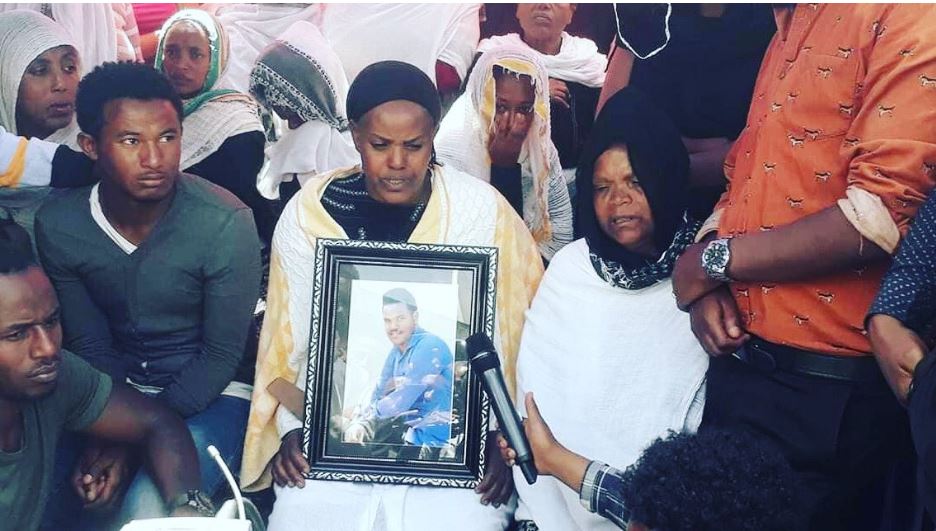 Families mourn the death of one of the victims identified as Michas Thomas